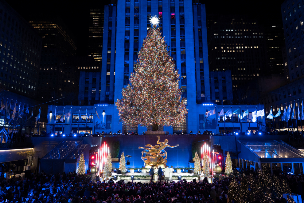 Rockefeller Center Christmas tree, a holiday icon, is illuminated in ...